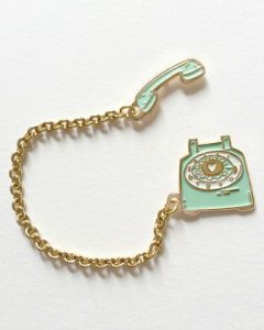 Have fun with lapel pins! add sparkles, chains, hinges and a glow